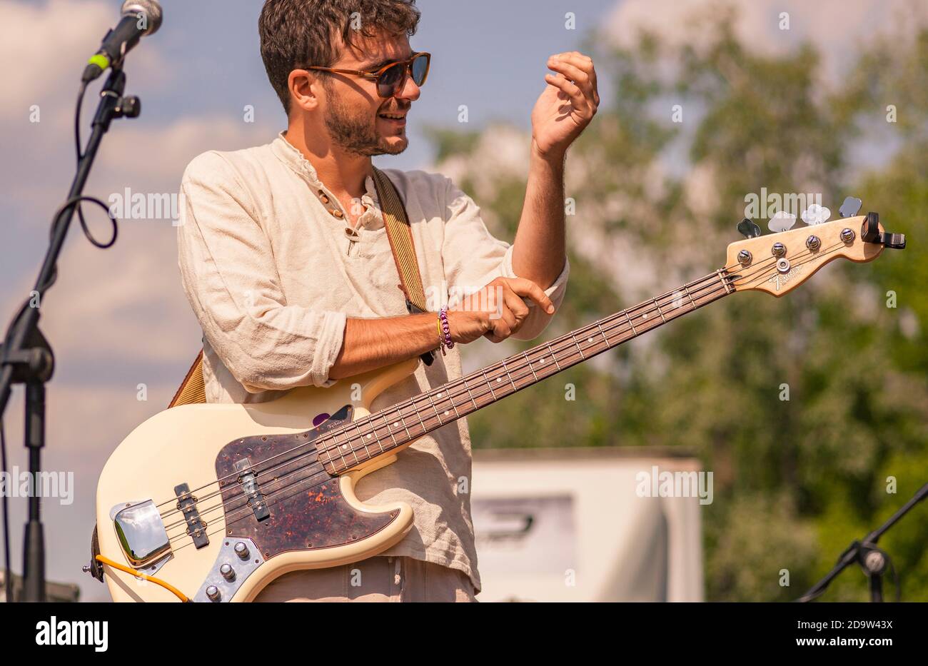 Bass player prepares for the live song during a rock concert Stock ...