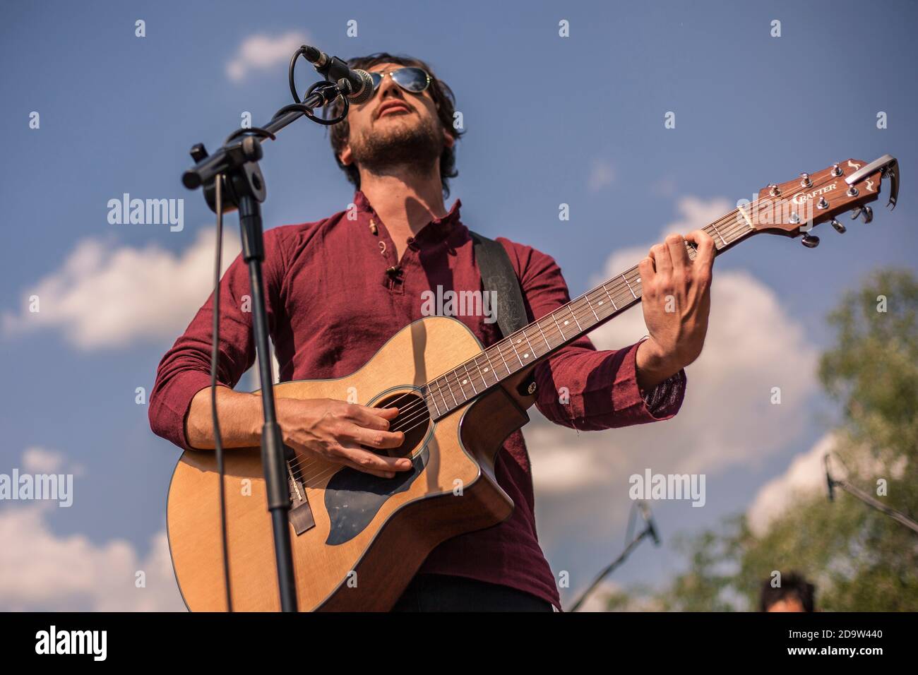 Singing at the microphone during a live rock concert Stock Photo - Alamy