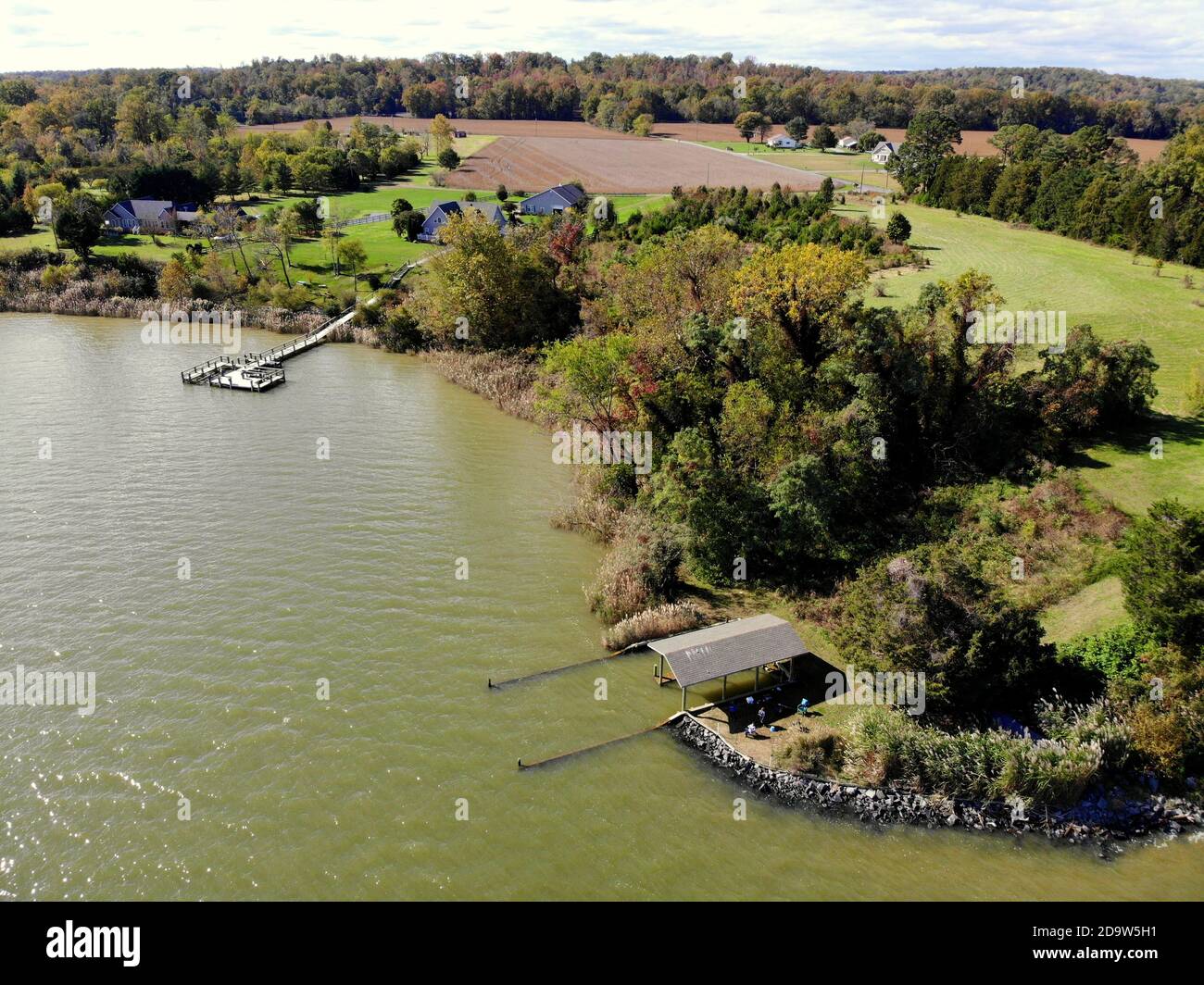 The aerial view of the boat dock and neighborhood near Currioman Bay ...
