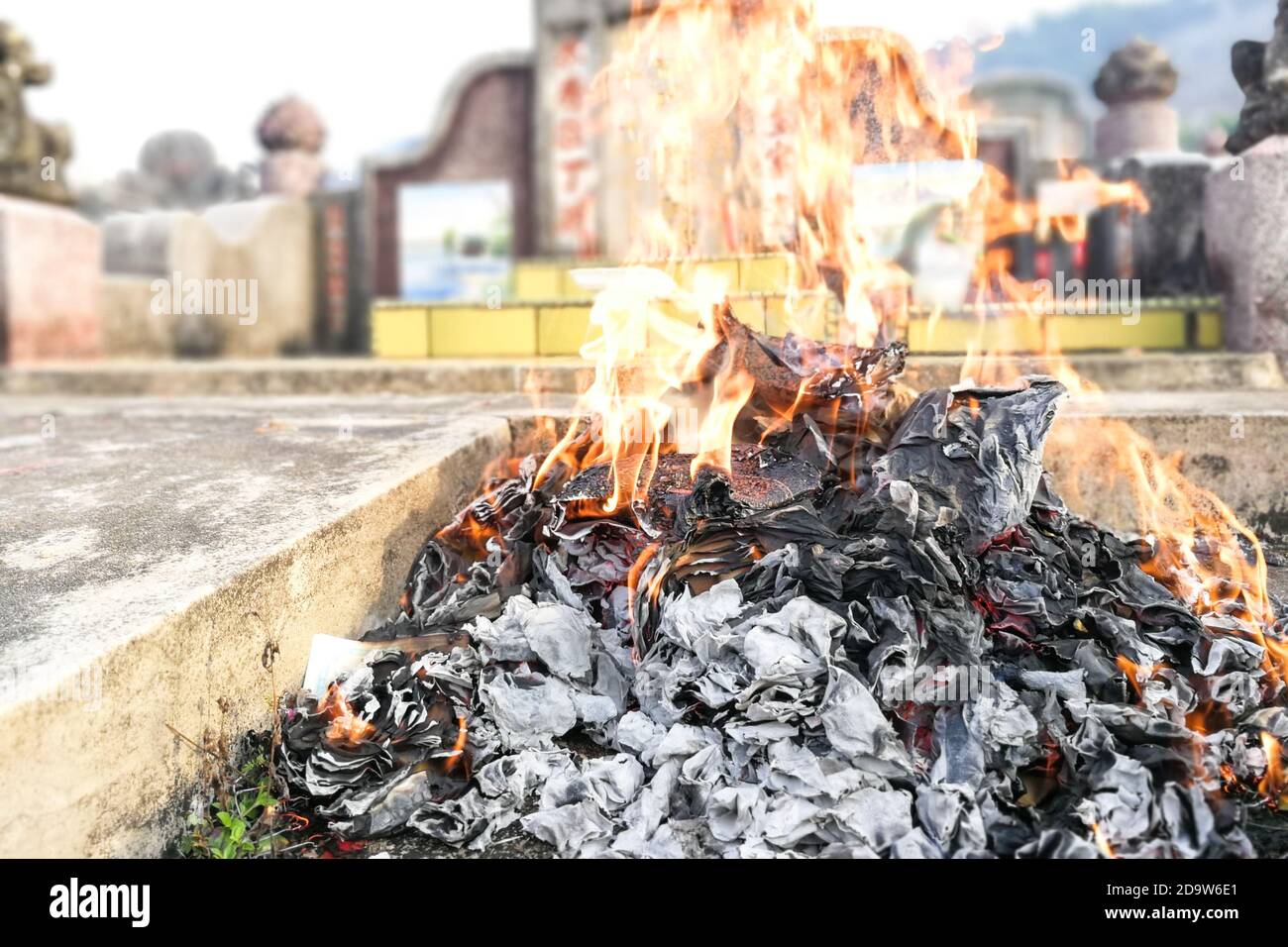 Burning paper money and other offerings during qingming in Malaysia ...