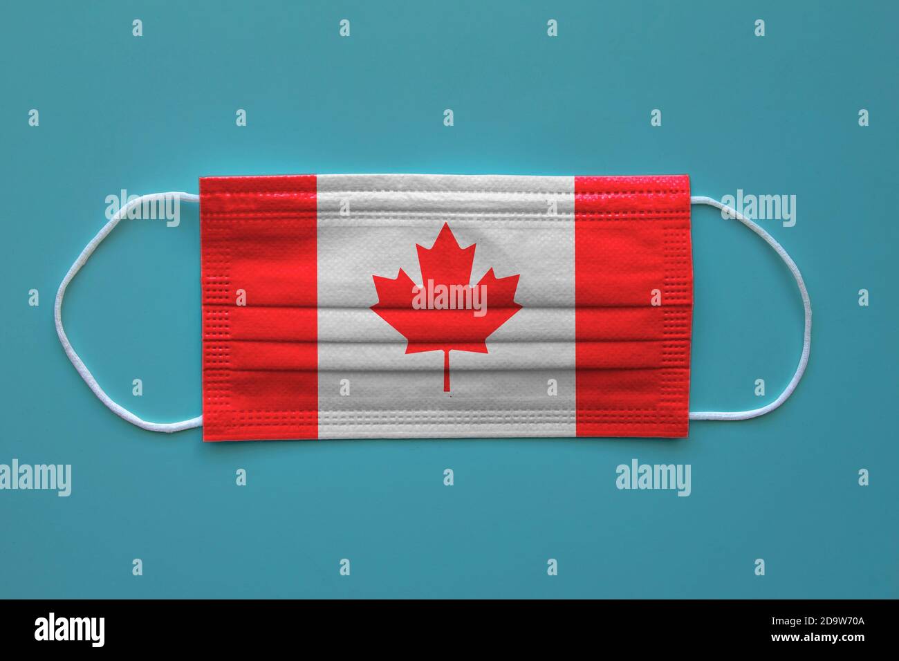 A face mask with a Canadian Flag on a clear background Stock Photo - Alamy