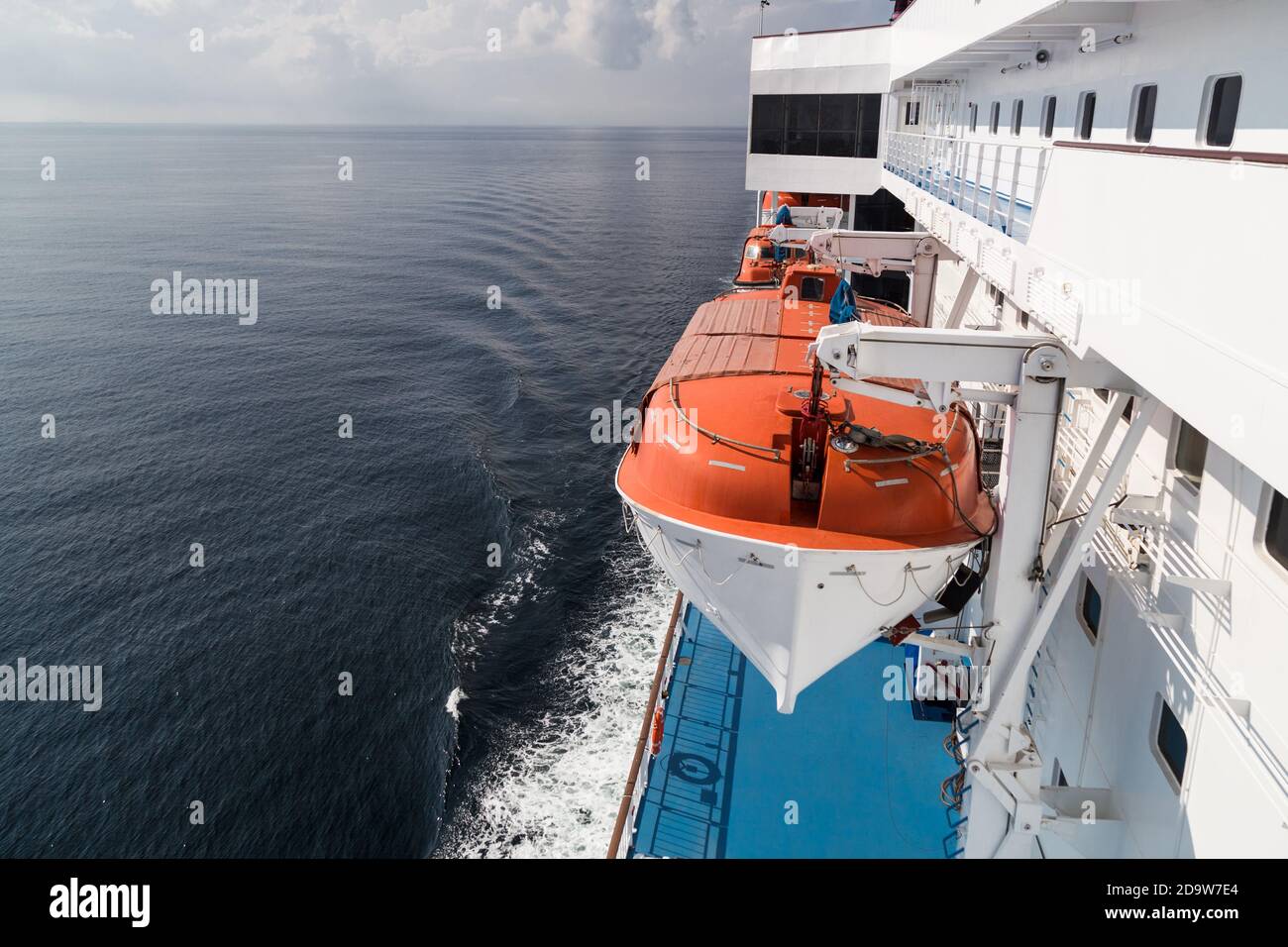 Cruise ship emergency safety rescue boat on deck Stock Photo - Alamy