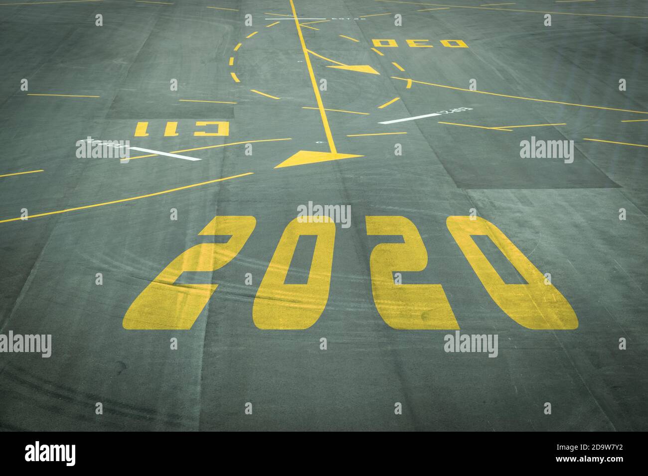 The 2020 number sign on the airport runway shows the coming New Year's ...