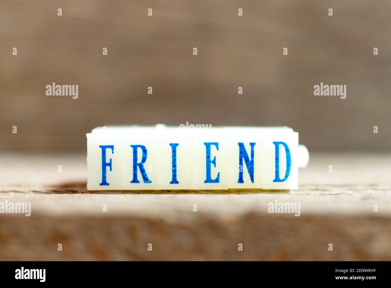 Letter block with blue color word friend on wood background Stock Photo ...