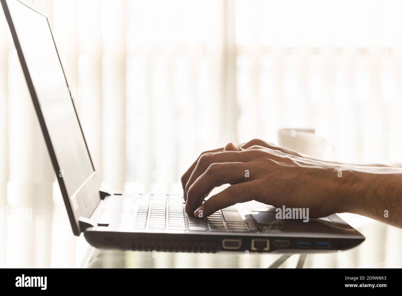 Close-up hands of businessmen are using laptops in the office Stock ...