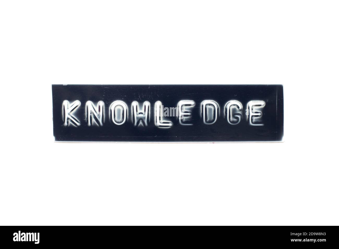 Embossed letter in word knowledge on black banner with white background ...