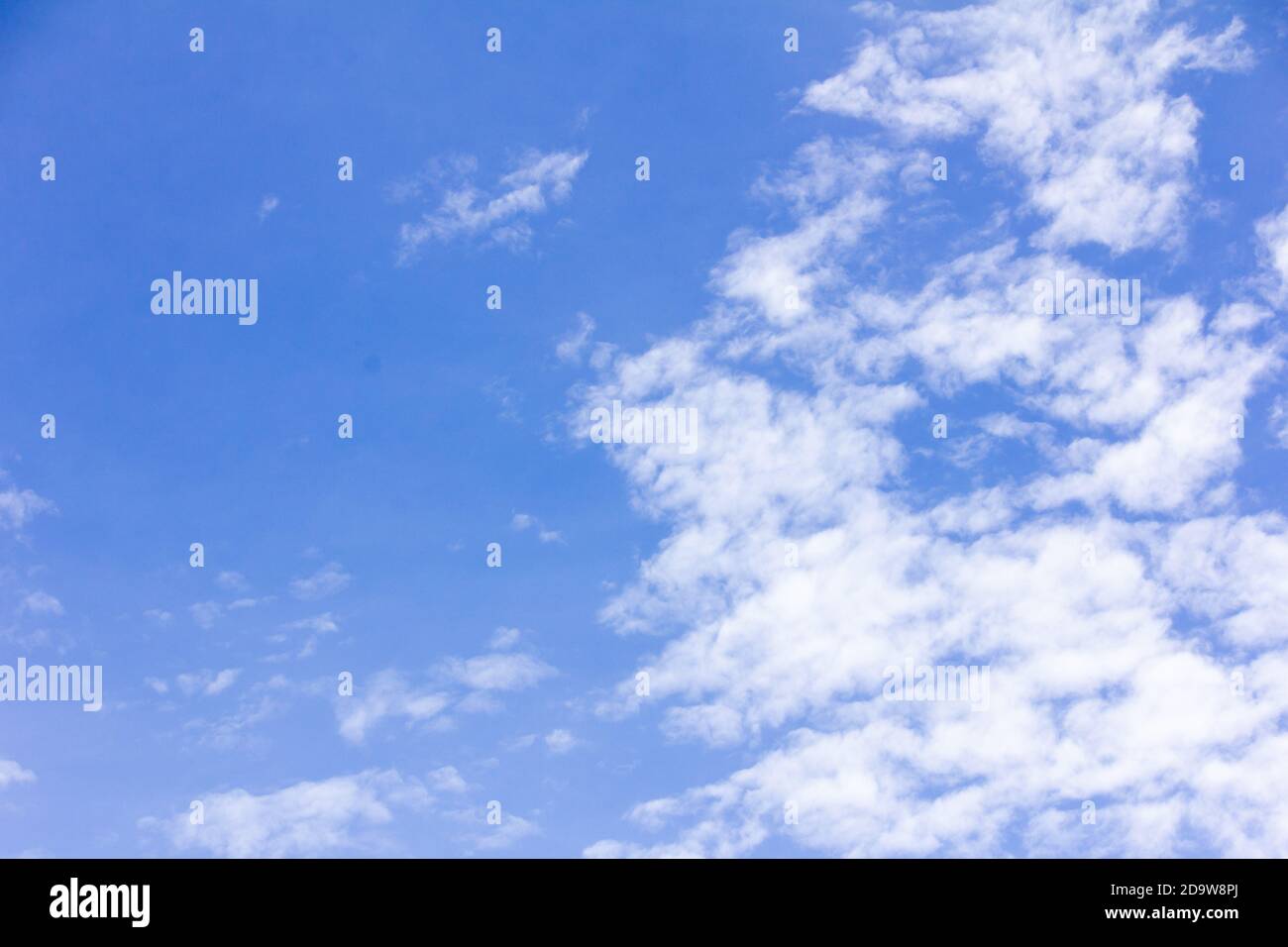 Clear blue color sky with white cloud background Stock Photo - Alamy
