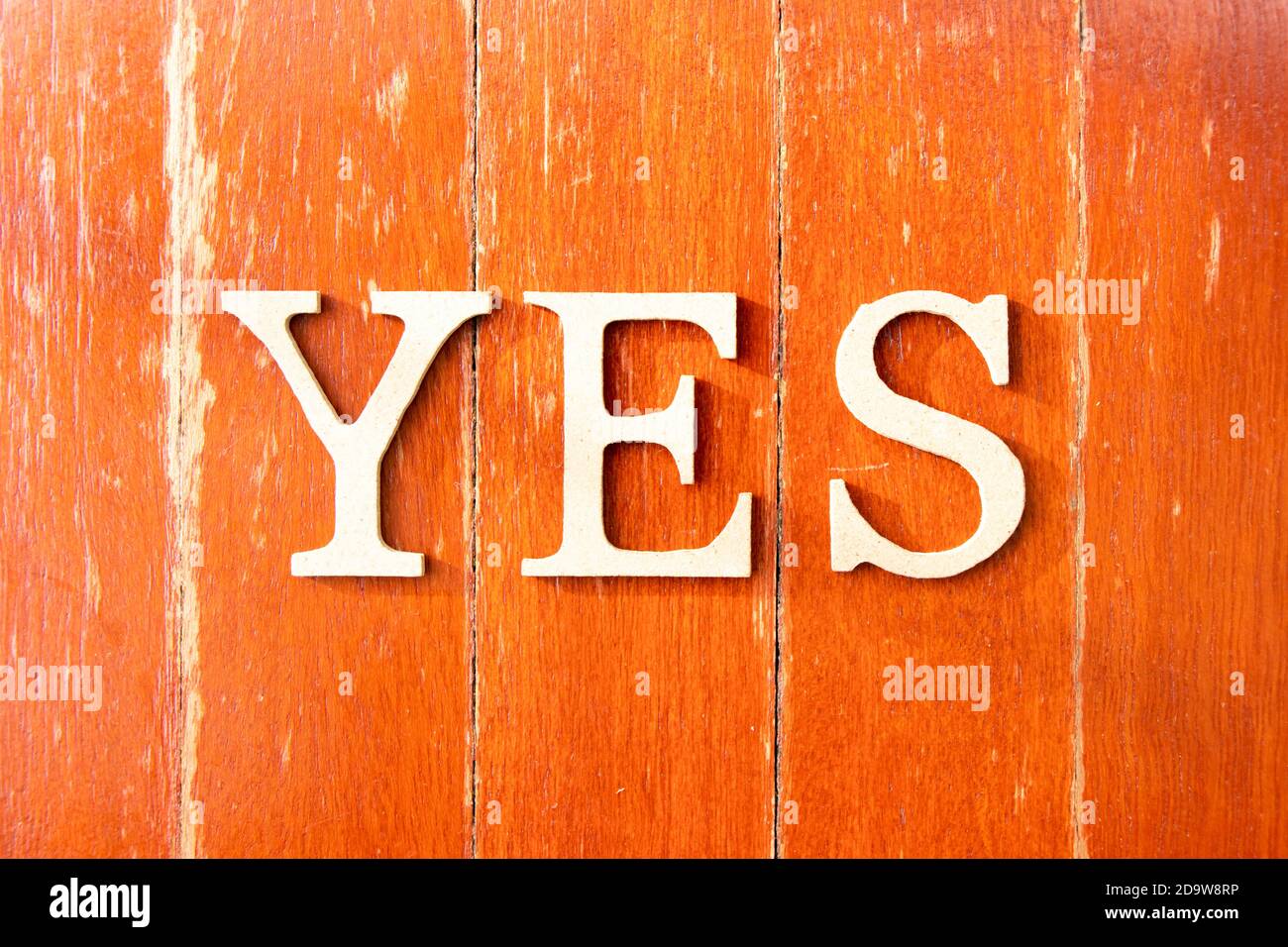 Alphabet letter in word yes on old red color wood plate background ...