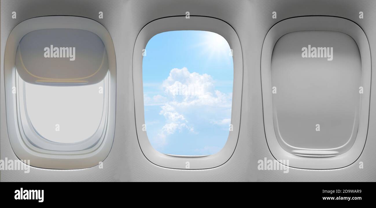 Closeup group of the airplane windows with the clouds sky background ...