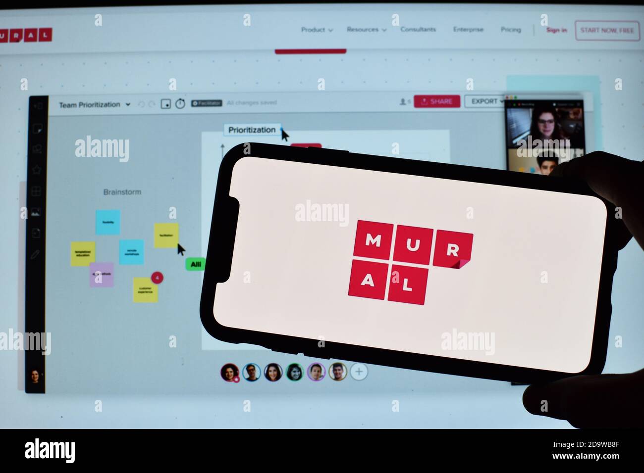 Smart phone with the Mural logo is a digital workspace for visual ...
