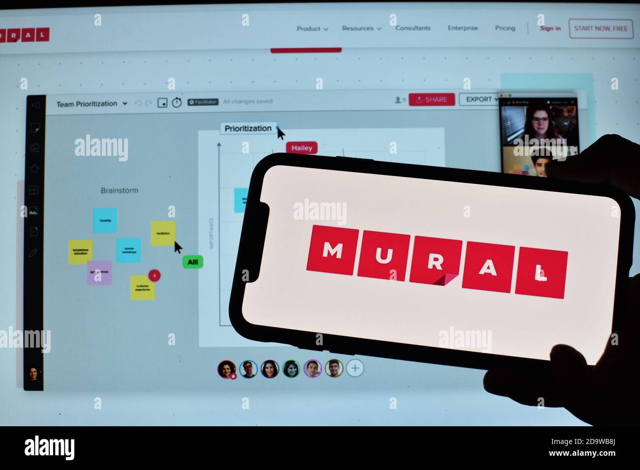 Smart phone with the Mural logo is a digital workspace for visual ...
