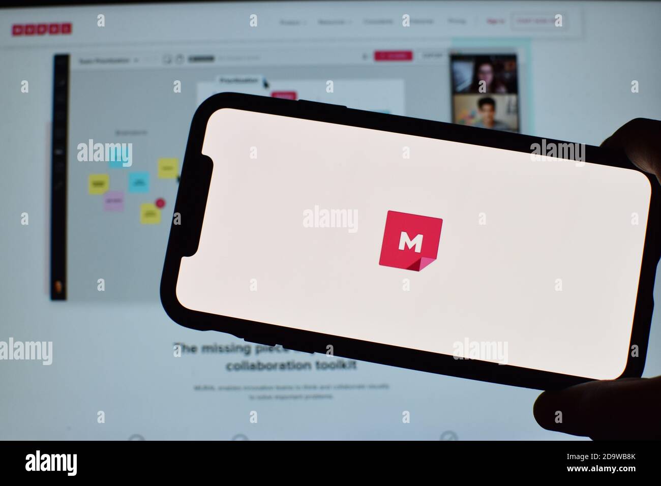 Smart phone with the Mural logo is a digital workspace for visual ...