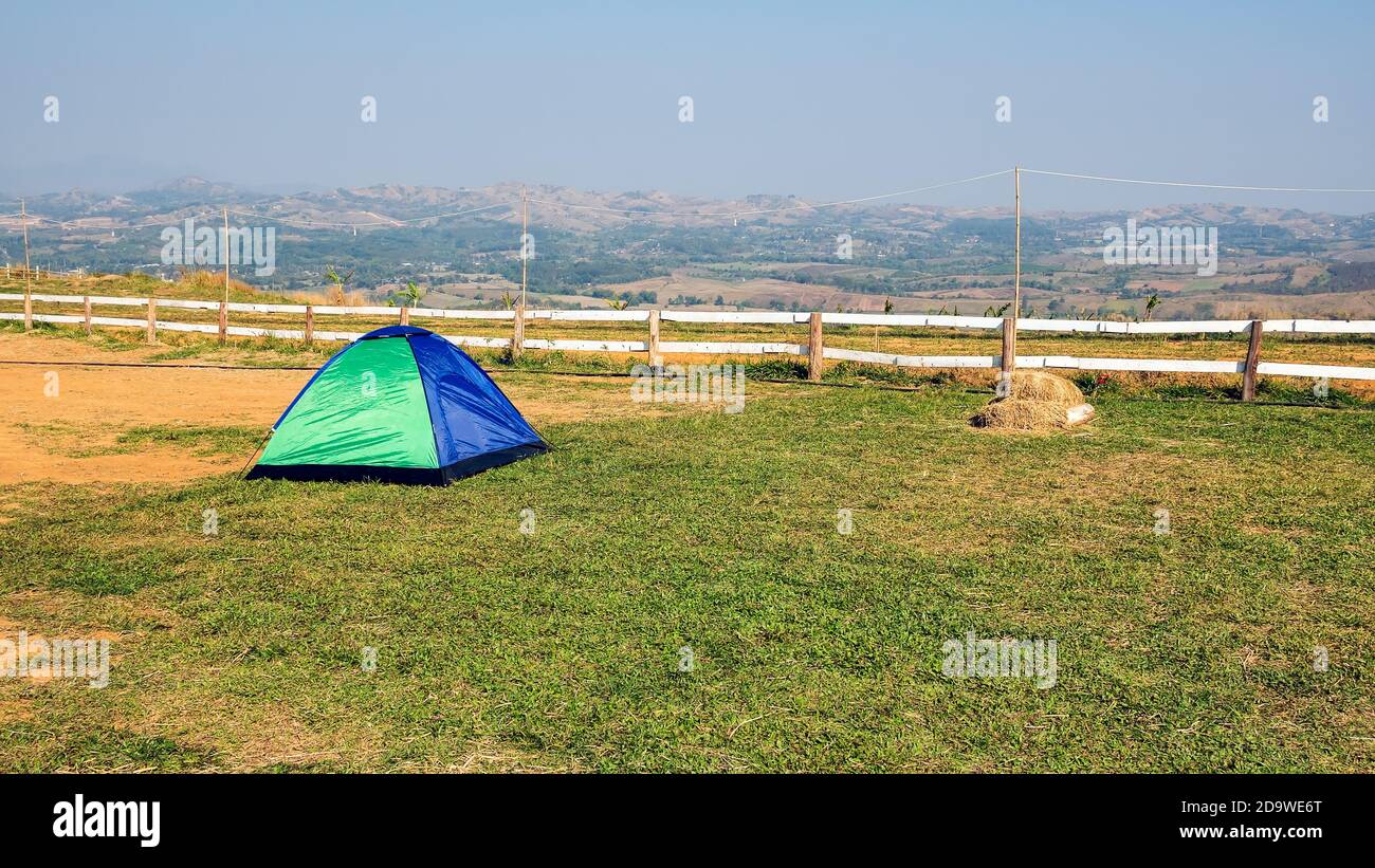 Tourist tent camp on the lawn on the highest point of the mountain ...