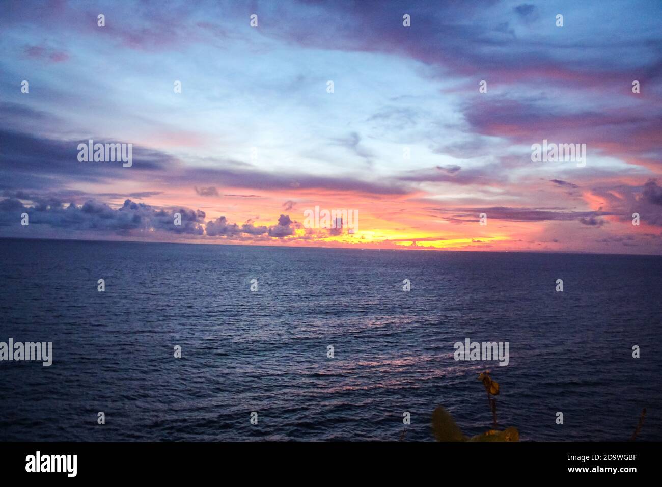 Sunset at Uluwatu Cliff, Bali Stock Photo - Alamy