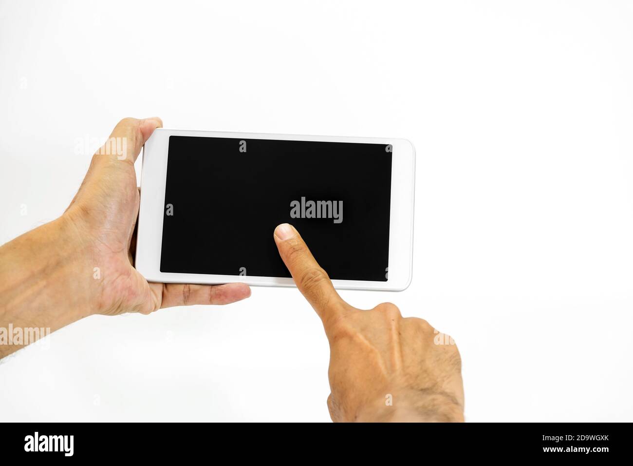 Men's hand holding a tablet on white background Stock Photo - Alamy