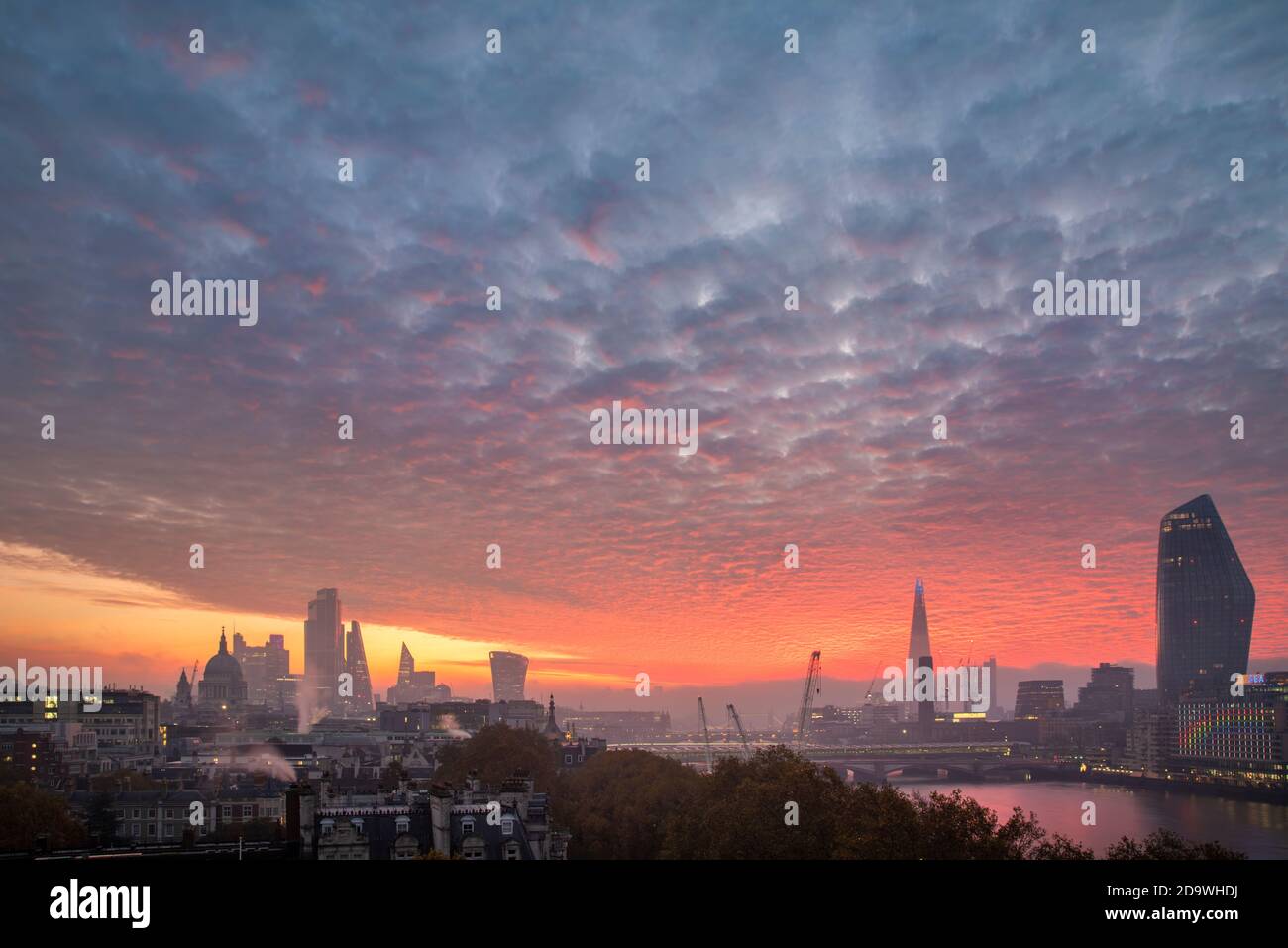 Epic sunrise over London city skyline with stunning sky formations over ...