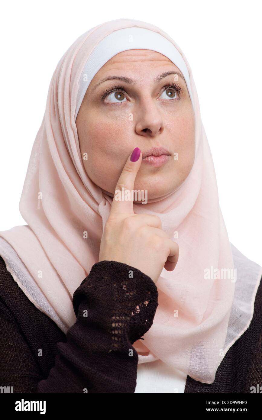 Beautiful Muslim Woman Thinking , Looking Up over White Background ...