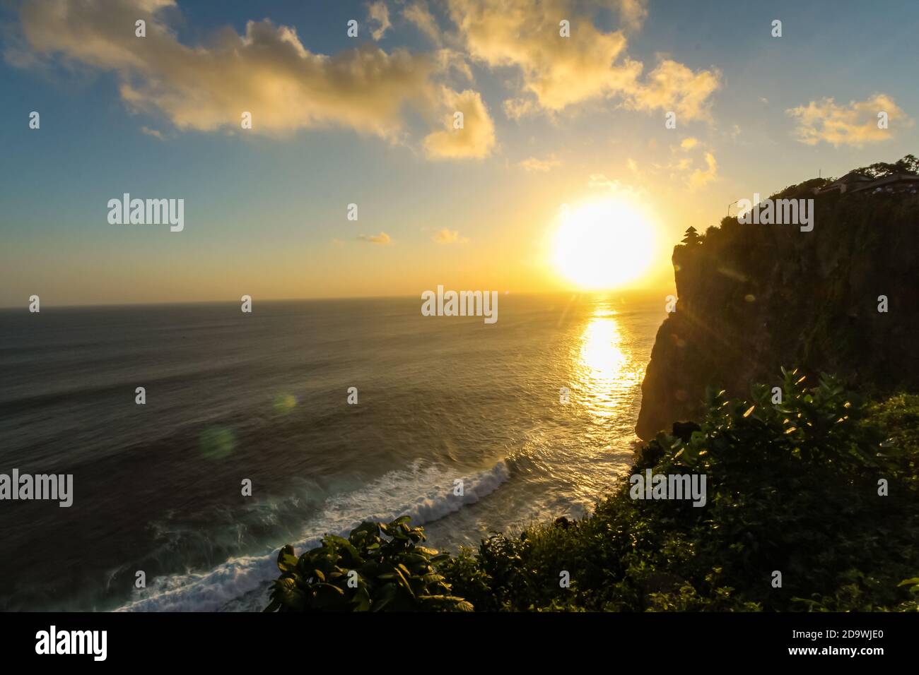 Sunset at Uluwatu Temple at Uluwatu Beach, Bali Stock Photo - Alamy