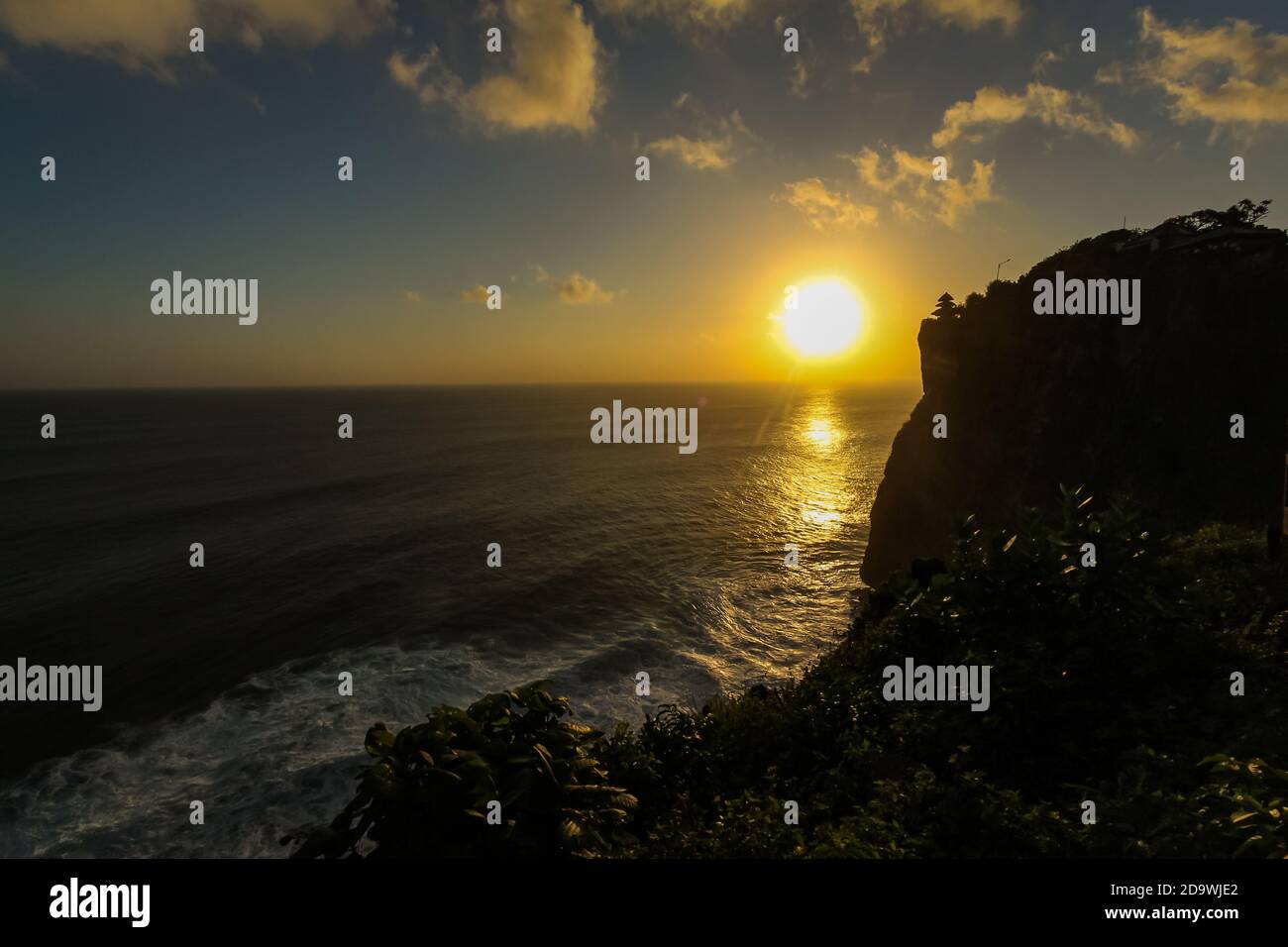 Sunset at Uluwatu Temple at Uluwatu Beach, Bali Stock Photo - Alamy