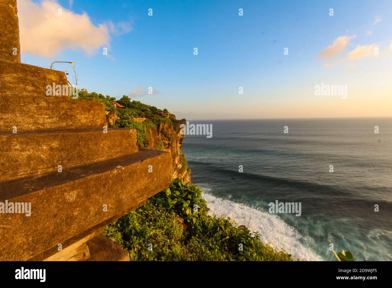 Sunset at Uluwatu Temple at Uluwatu Beach, Bali Stock Photo - Alamy