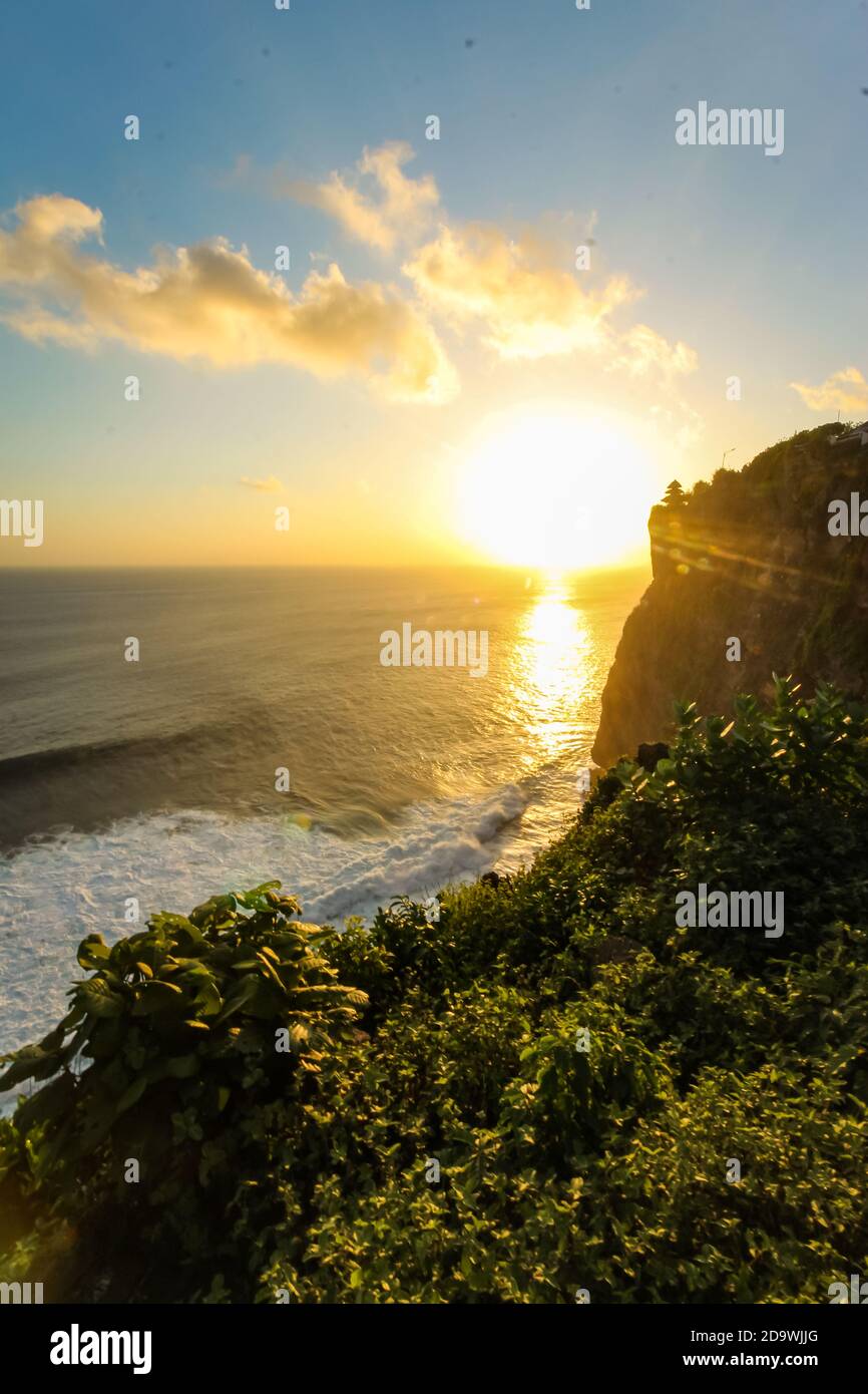 Sunset at Uluwatu Temple at Uluwatu Beach, Bali Stock Photo - Alamy