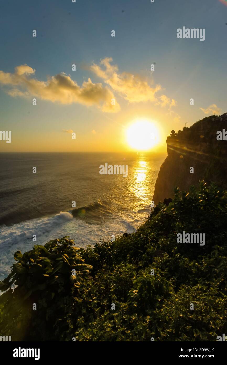 Sunset at Uluwatu Temple at Uluwatu Beach, Bali Stock Photo - Alamy