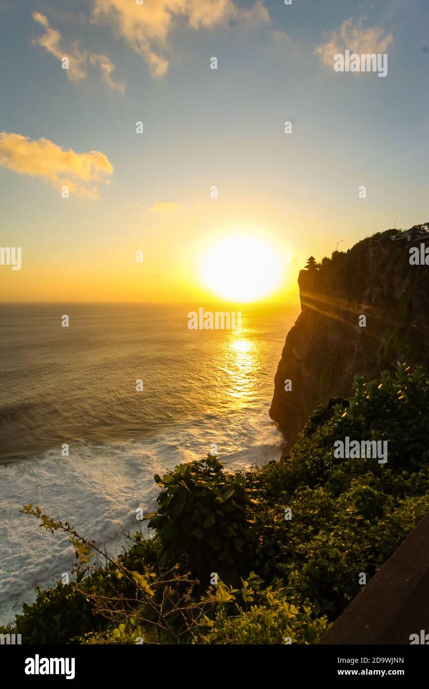Sunset at Uluwatu Temple at Uluwatu Beach, Bali Stock Photo - Alamy