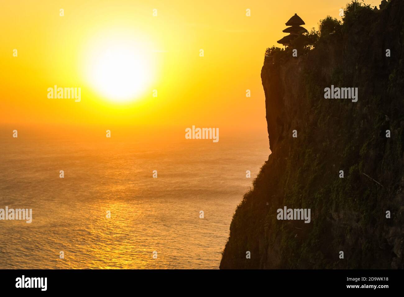 Sunset at Uluwatu Temple at Uluwatu Beach, Bali Stock Photo - Alamy