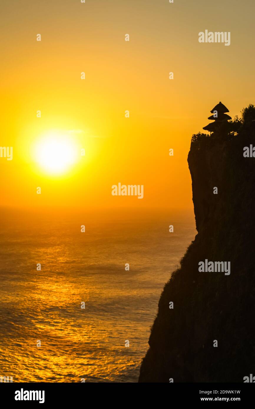 Sunset at Uluwatu Temple at Uluwatu Beach, Bali Stock Photo - Alamy