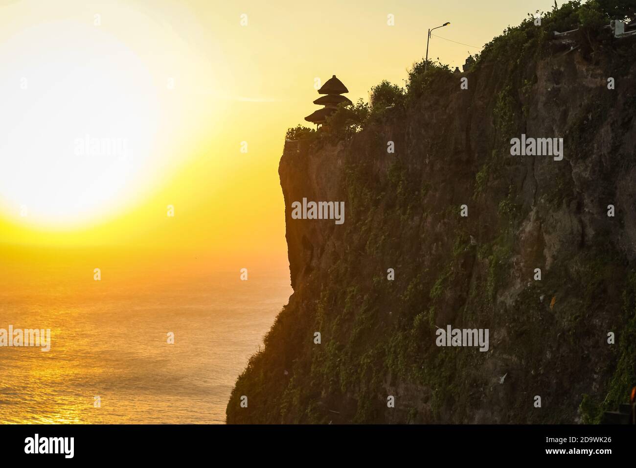 Sunset at Uluwatu Temple at Uluwatu Beach, Bali Stock Photo - Alamy