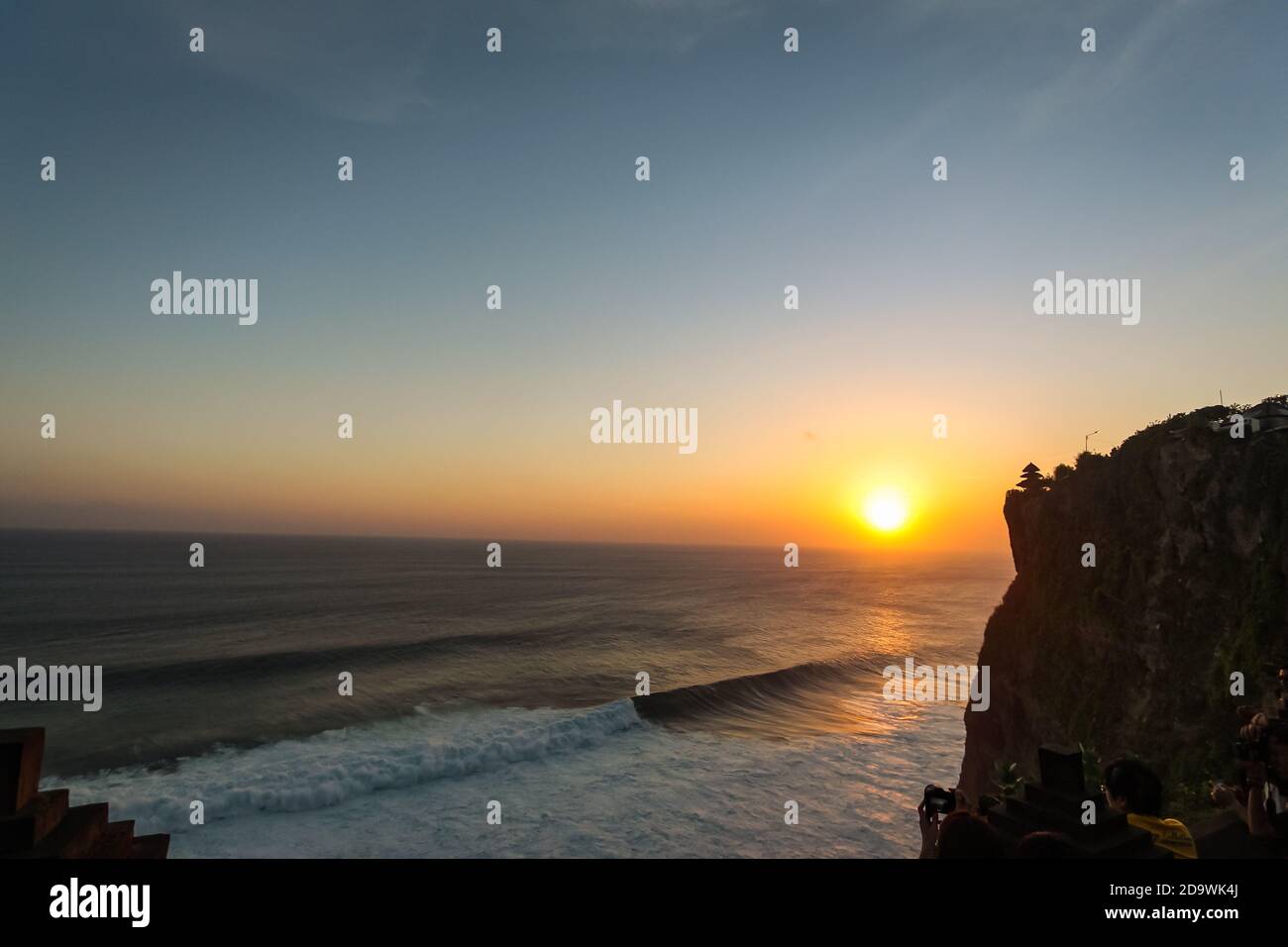 Sunset at Uluwatu Temple at Uluwatu Beach, Bali Stock Photo - Alamy