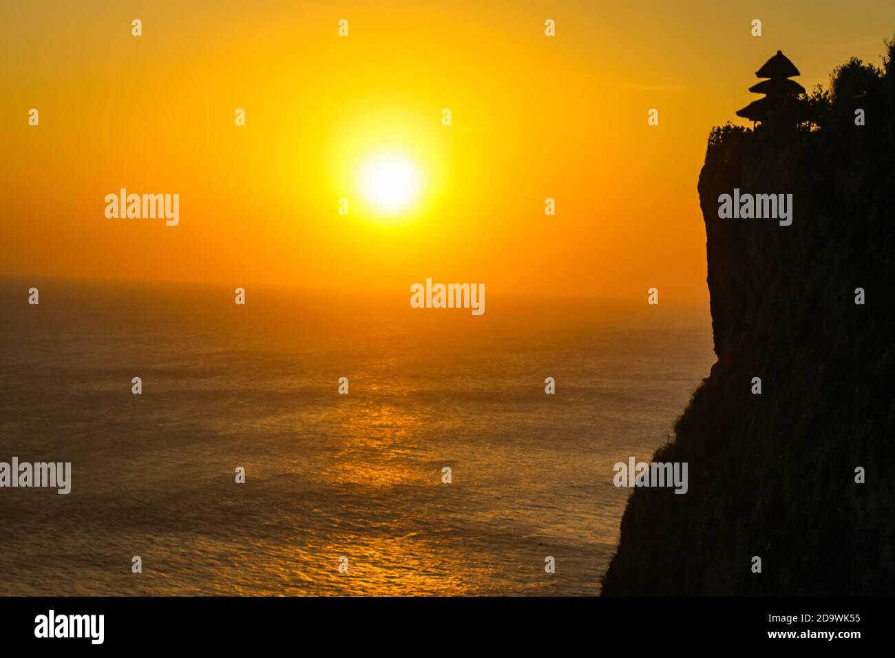 Sunset at Uluwatu Temple at Uluwatu Beach, Bali Stock Photo - Alamy
