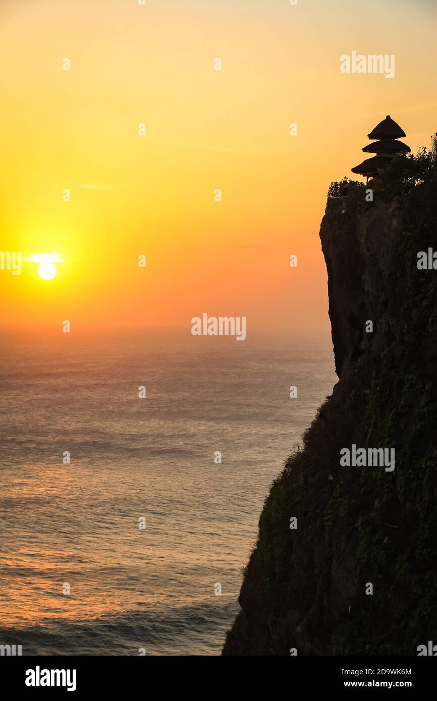 Sunset at Uluwatu Temple at Uluwatu Beach, Bali Stock Photo - Alamy