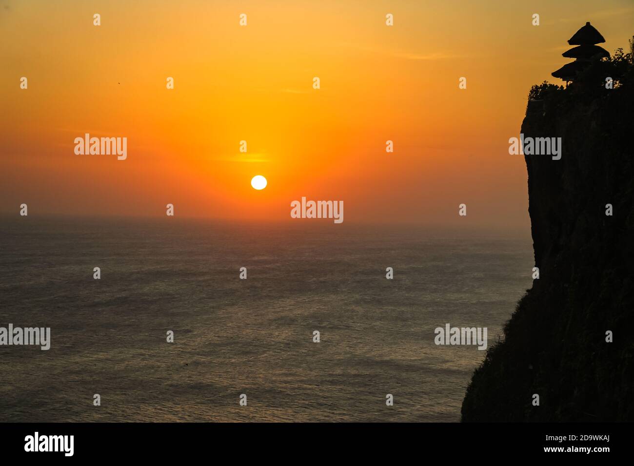 Sunset at Uluwatu Temple at Uluwatu Beach, Bali Stock Photo - Alamy