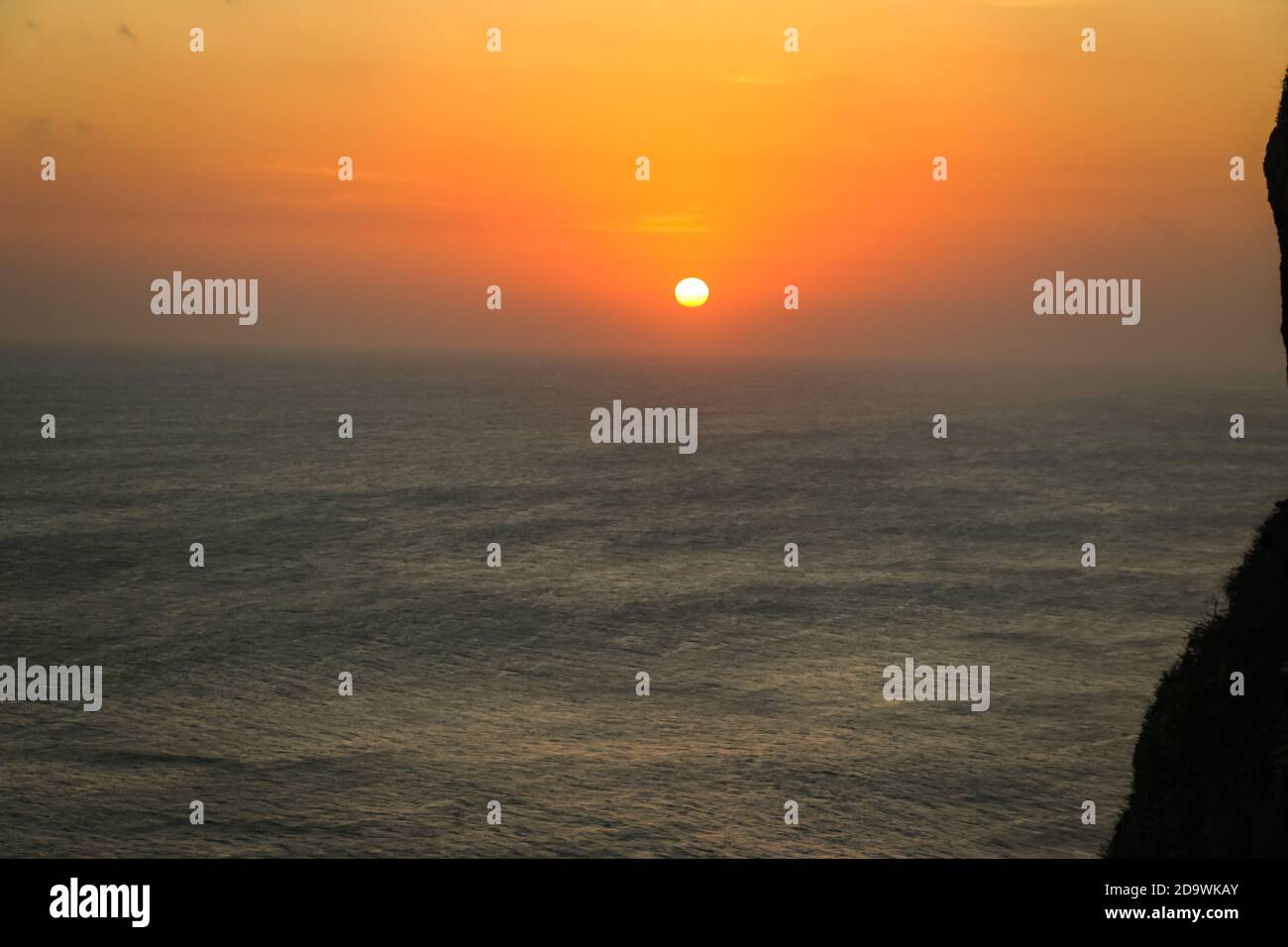 Sunset at Uluwatu Temple at Uluwatu Beach, Bali Stock Photo - Alamy