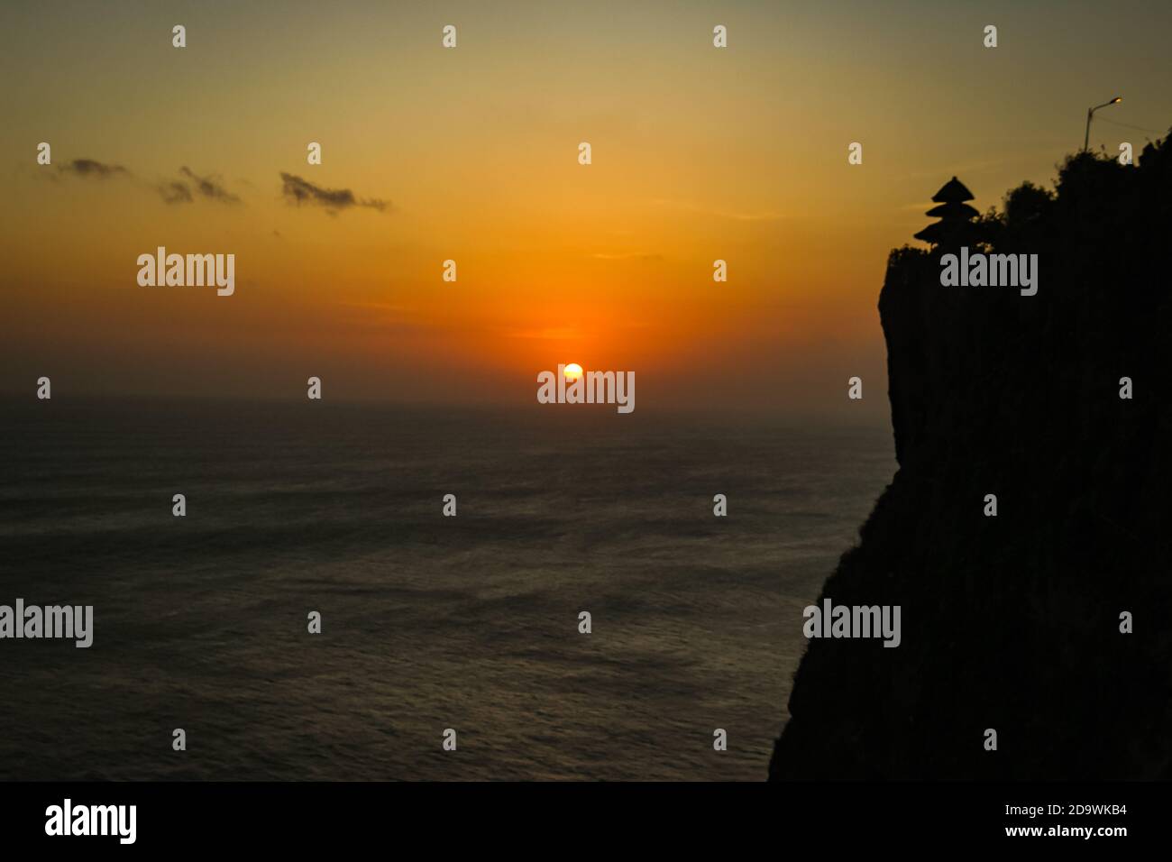 Sunset at Uluwatu Temple at Uluwatu Beach, Bali Stock Photo - Alamy