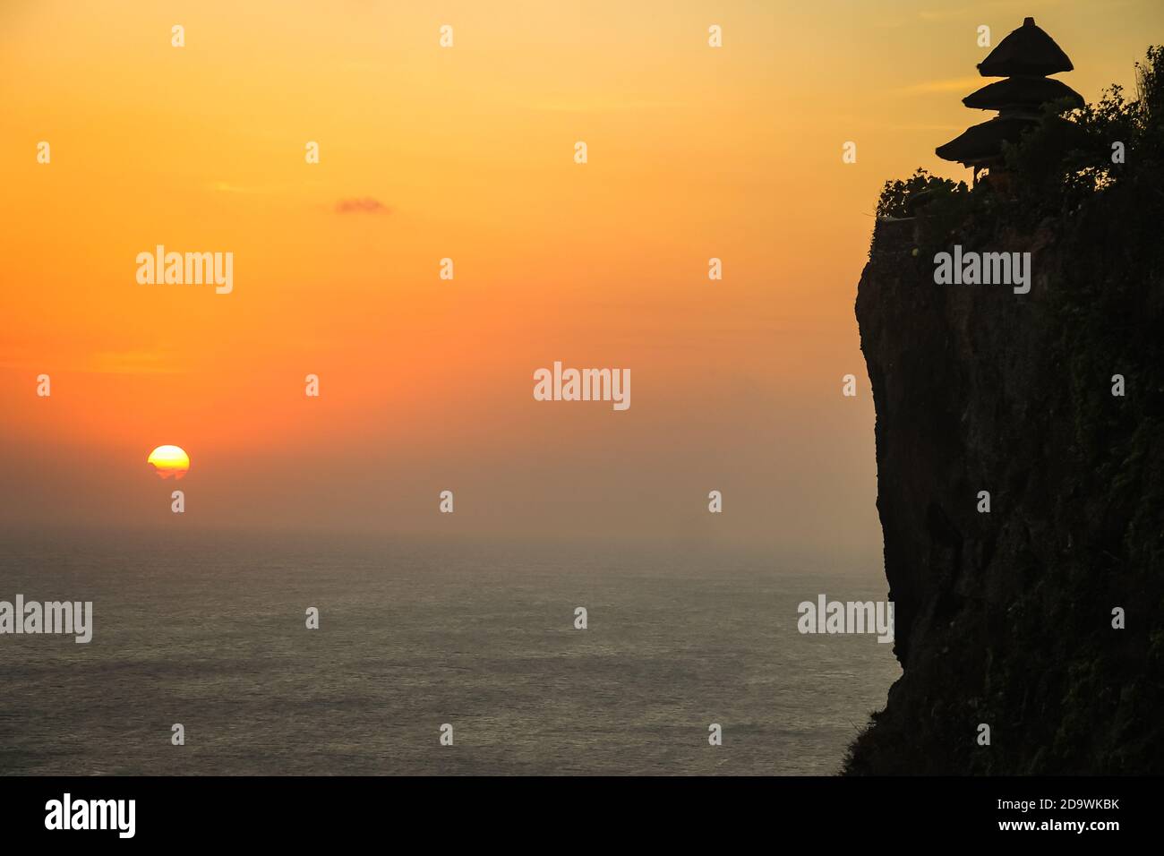 Sunset at Uluwatu Temple at Uluwatu Beach, Bali Stock Photo - Alamy