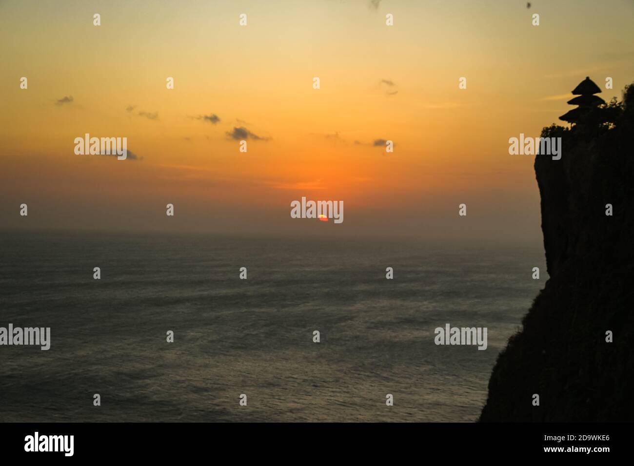 Sunset at Uluwatu Temple at Uluwatu Beach, Bali Stock Photo - Alamy