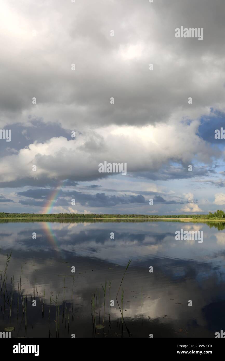 Rainbow over lake Seliger in summer, Tver region, Russia Stock Photo ...