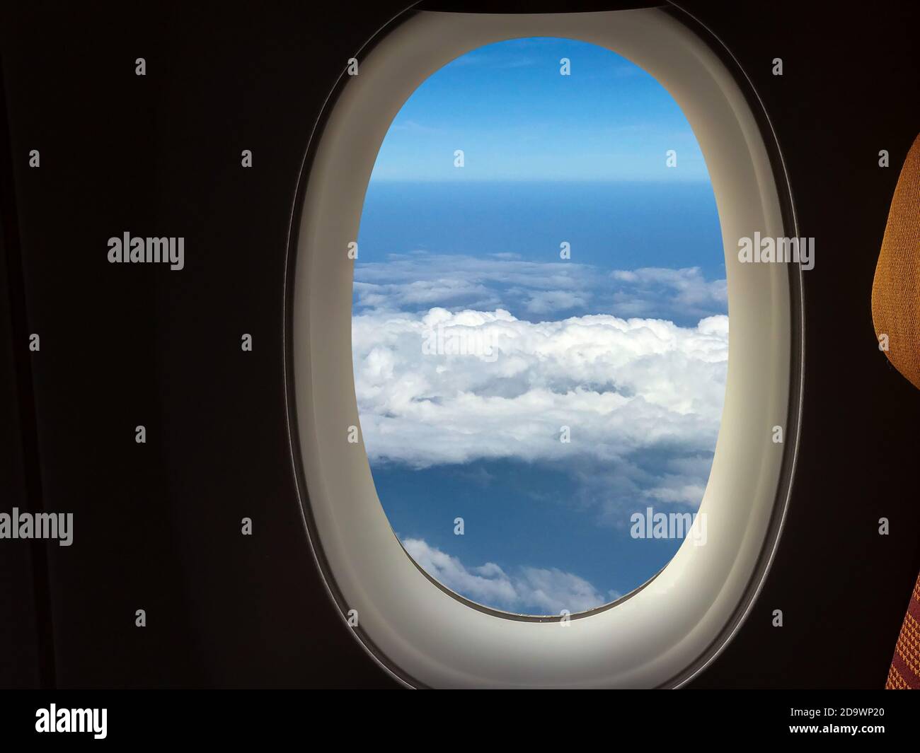 Closeup the window of the passenger plane and empty seats, concepts for ...