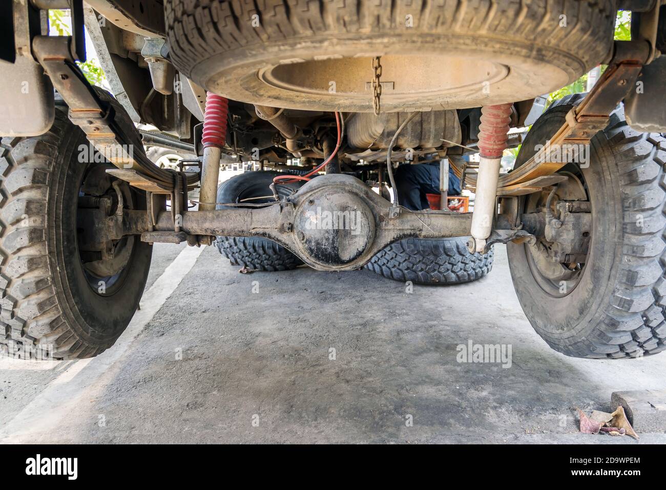 Bottom view of the suspension of the car parked in the garage, Concept ...