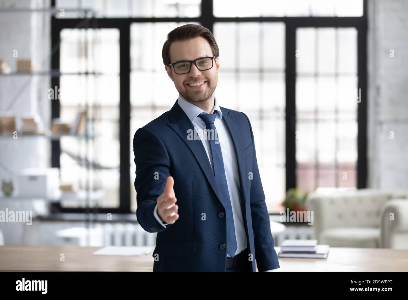 Hand reaching out suit hi-res stock photography and images - Alamy