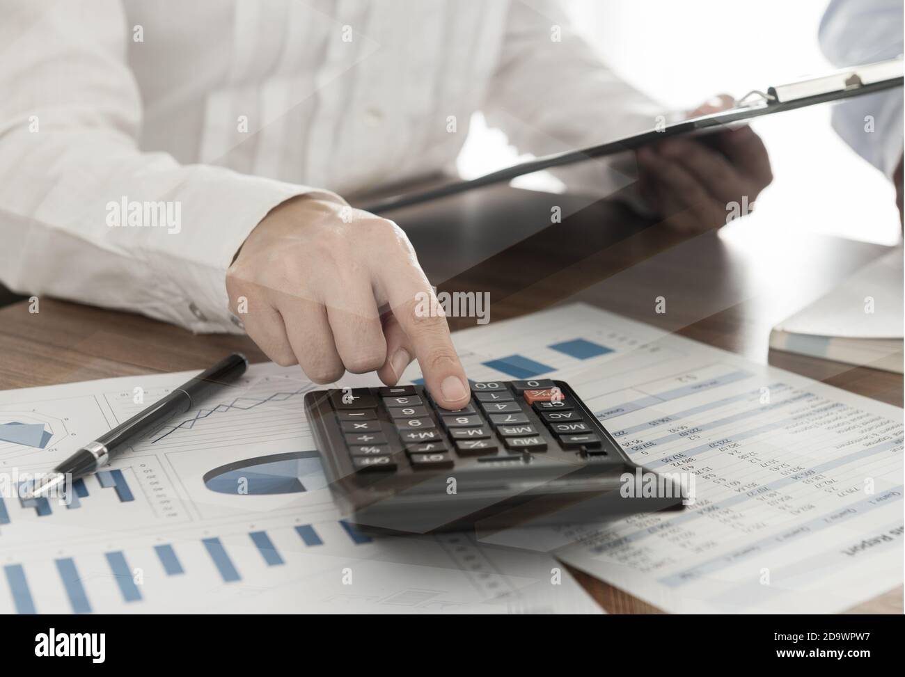 Accountant making calculations. Bookkeeping, Finances and Accounting ...