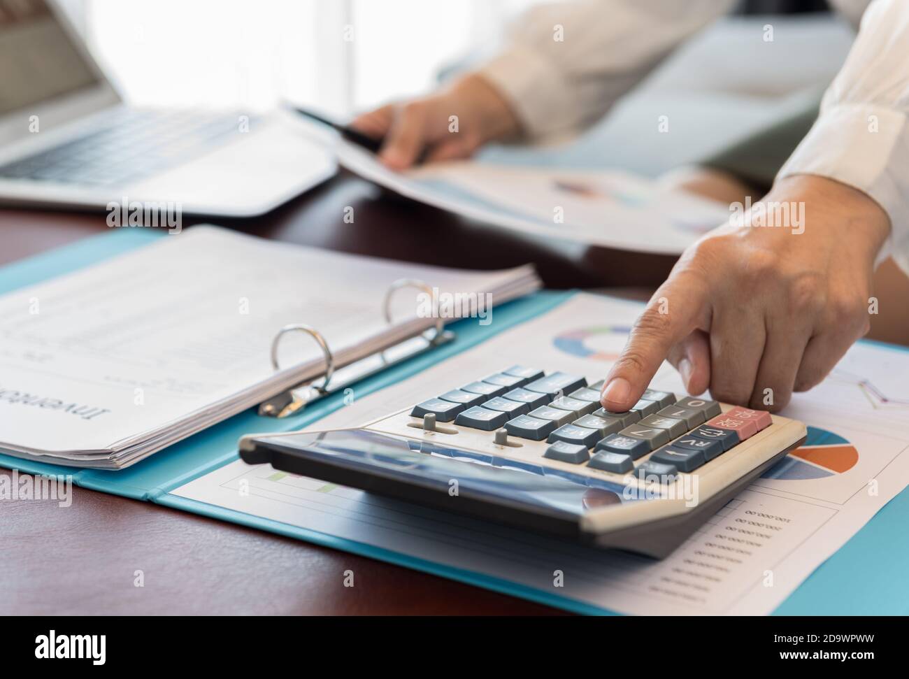 women accountant or banker making calculation interest. concepts of ...