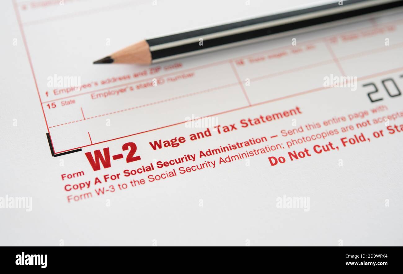 Tax forms, form W-2 wage and tax statement Stock Photo - Alamy