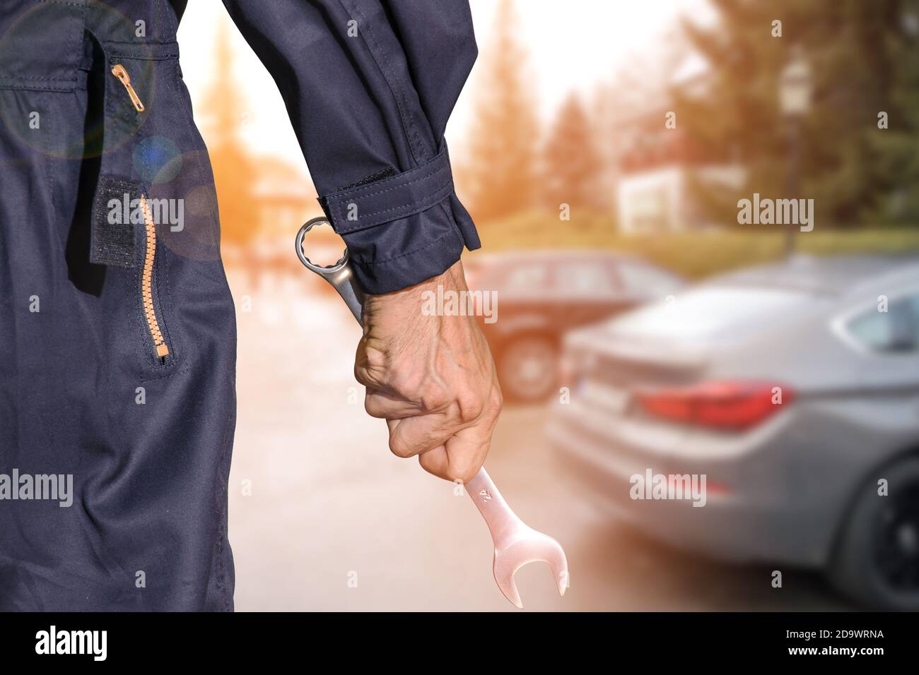Technician wearing dark uniform hi-res stock photography and images - Alamy