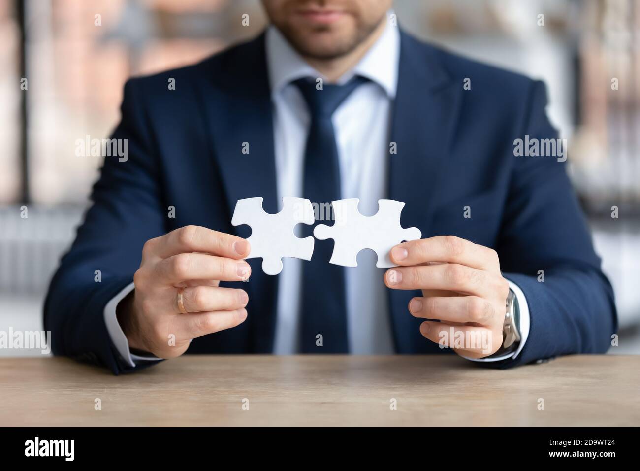 Focused young businessman finding difficult problem solution Stock ...