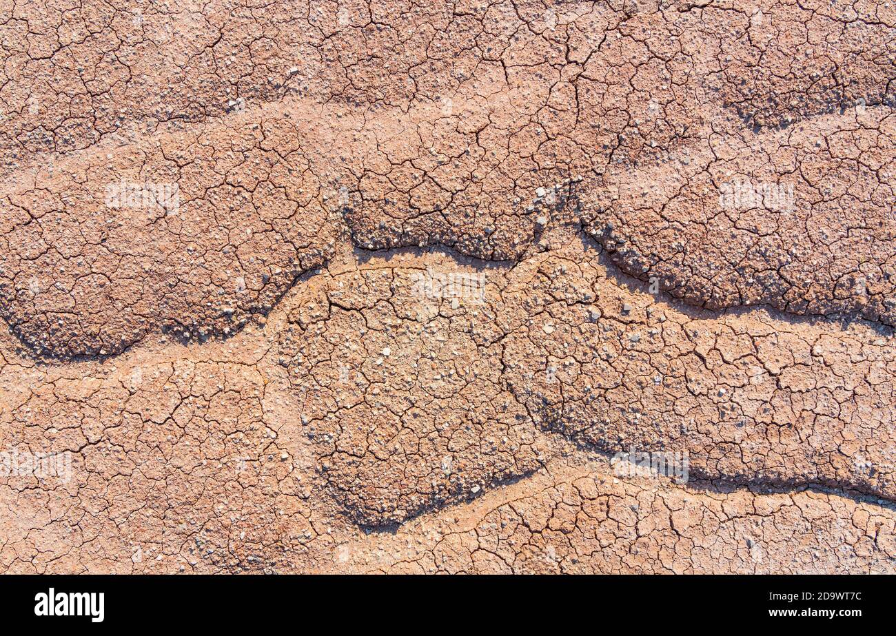 Dry barren cracked soil background Stock Photo - Alamy