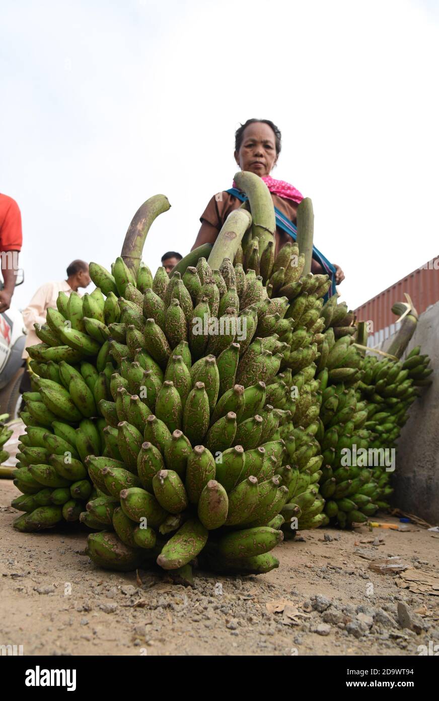 Guwahati, Assam, India. 6th Nov, 2020. Villagers wait for customers to ...