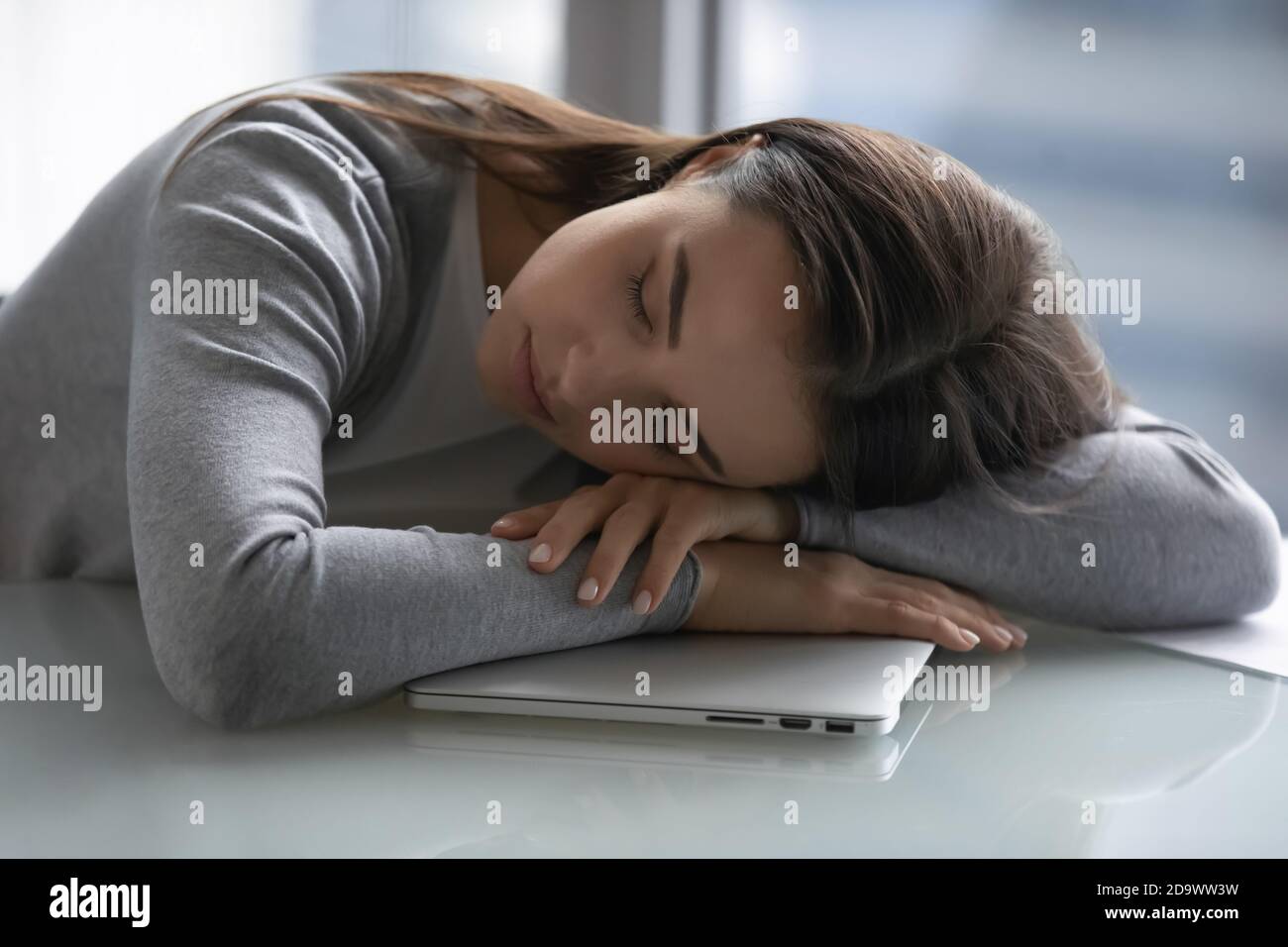 Female asleep head on hands hi-res stock photography and images - Alamy